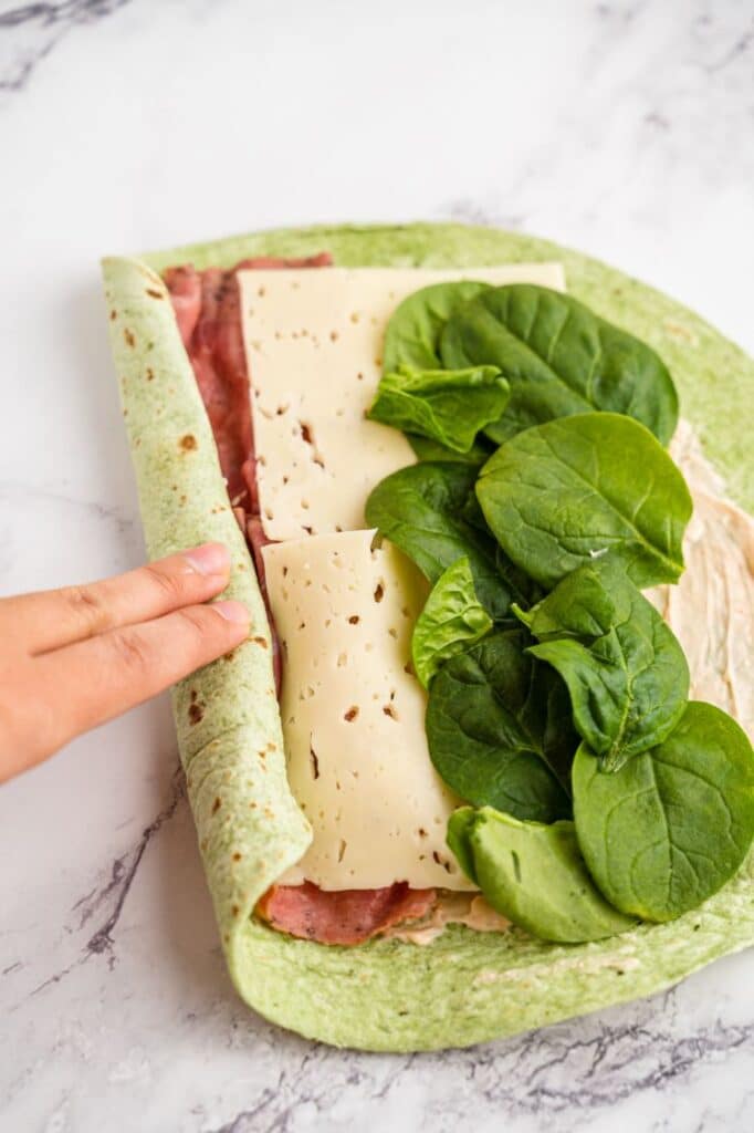 Easy Sandwich Pinwheels With Spinach and Pastrami - Totes In My Lunchbox